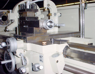 Machine may be shown with optional accessories